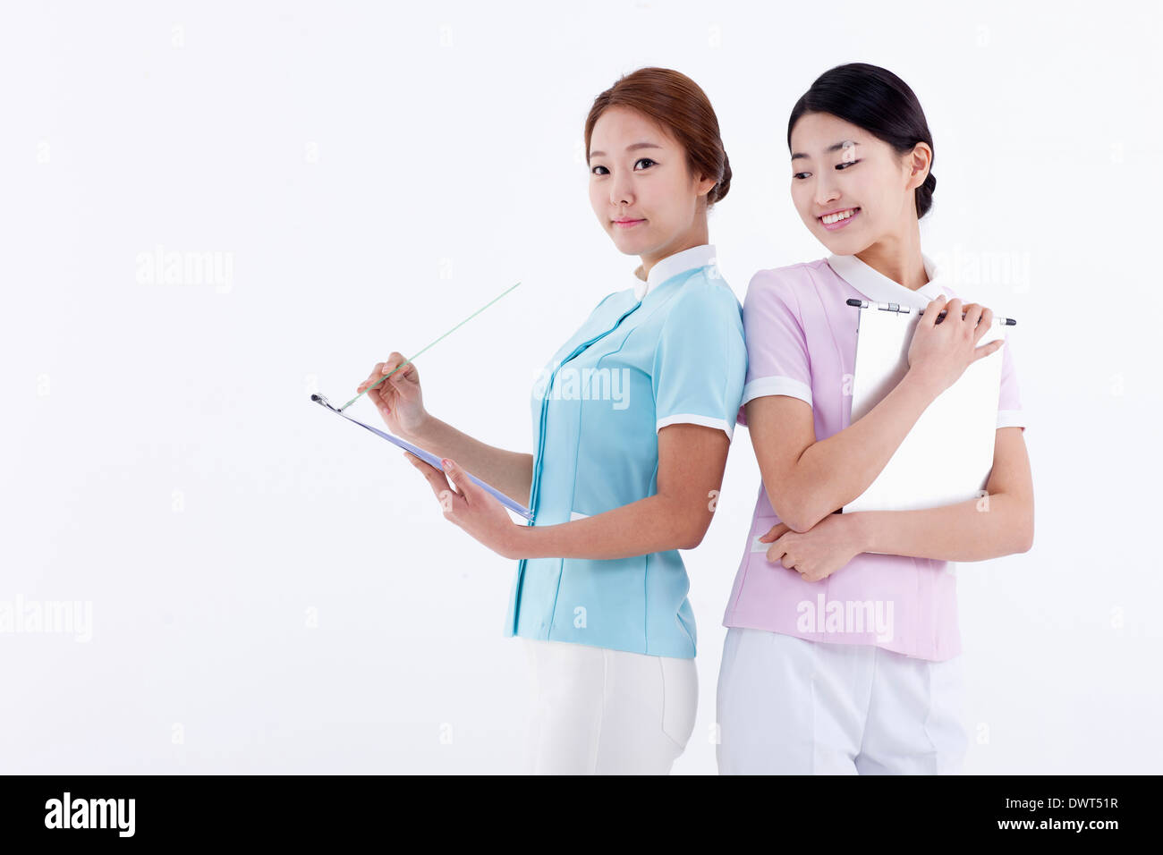 Two nurses posing patient hi-res stock photography and images - Alamy