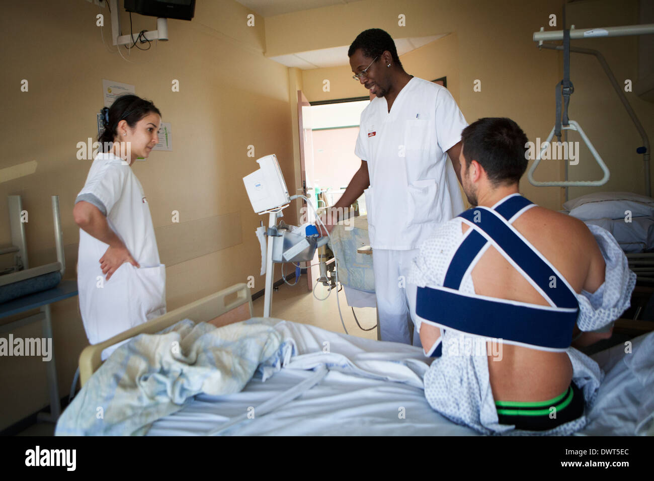 Nurses with patient Stock Photo - Alamy