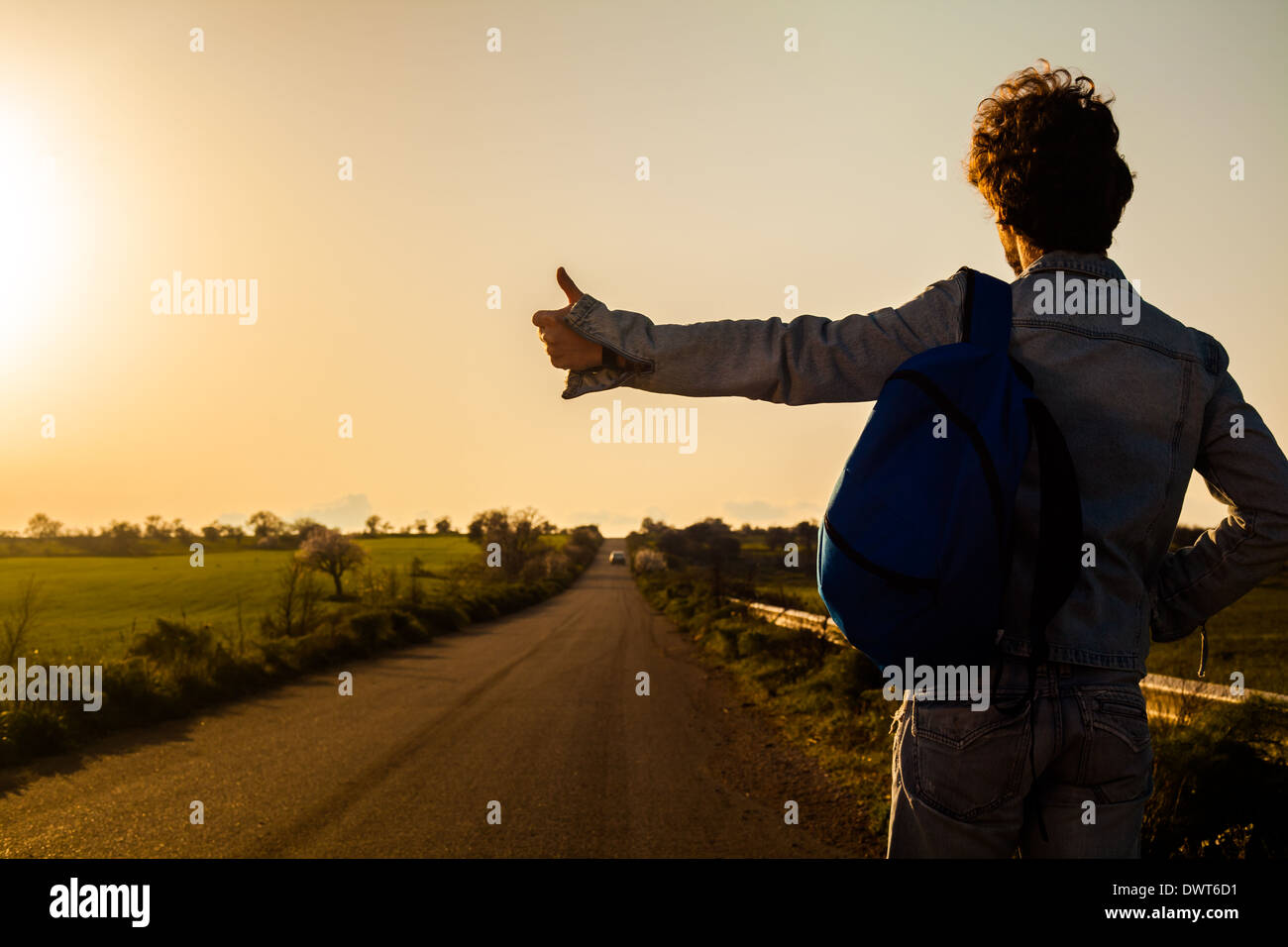 Hitchhiking road hi-res stock photography and images - Alamy