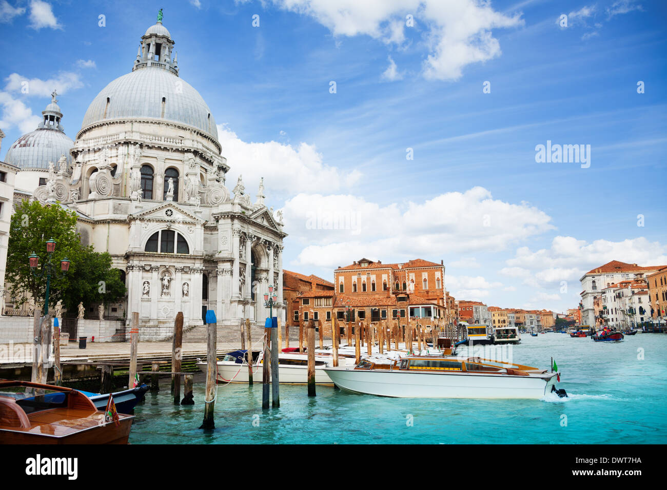 Santa Maria della Salute Basilica in Venice with boats embarked Stock ...