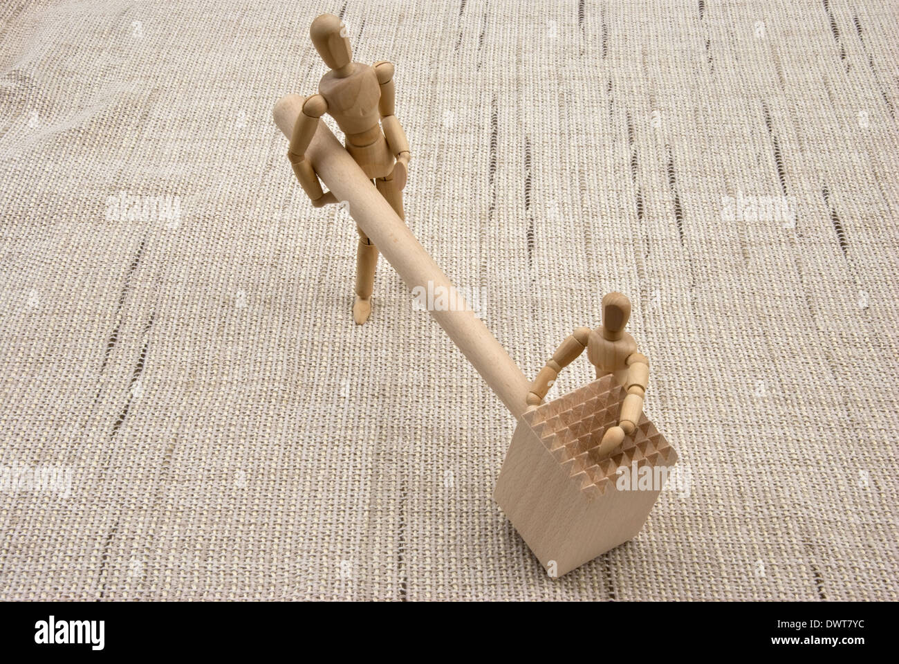 Two manikins with a meat tenderizer Stock Photo - Alamy