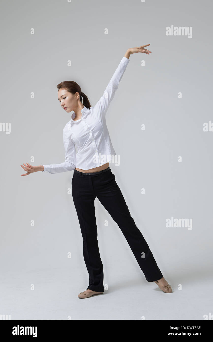 Woman making dance poses hi-res stock photography and images - Alamy