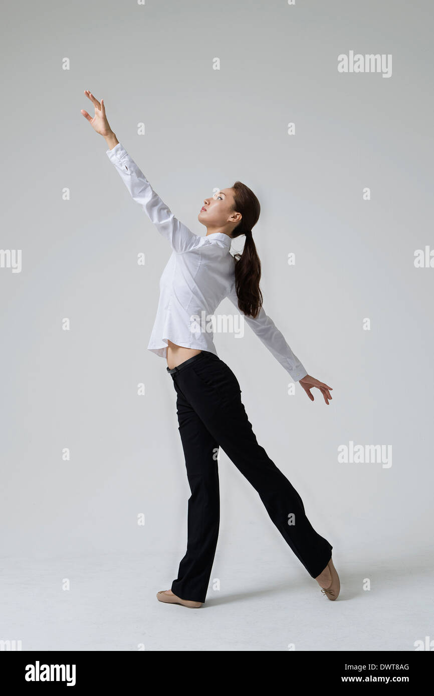 a woman making dance poses Stock Photo - Alamy