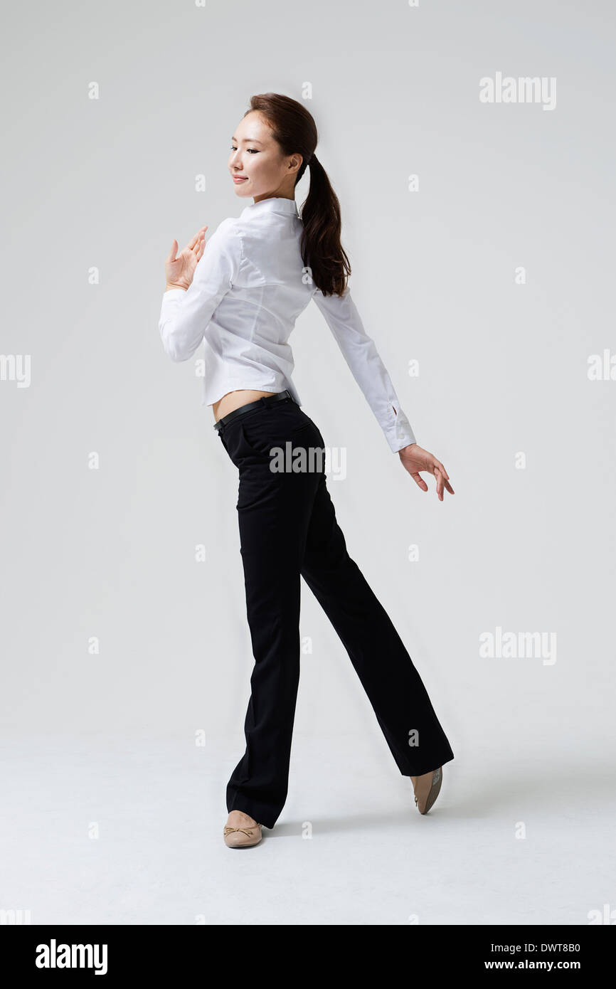 a woman making dance poses Stock Photo - Alamy