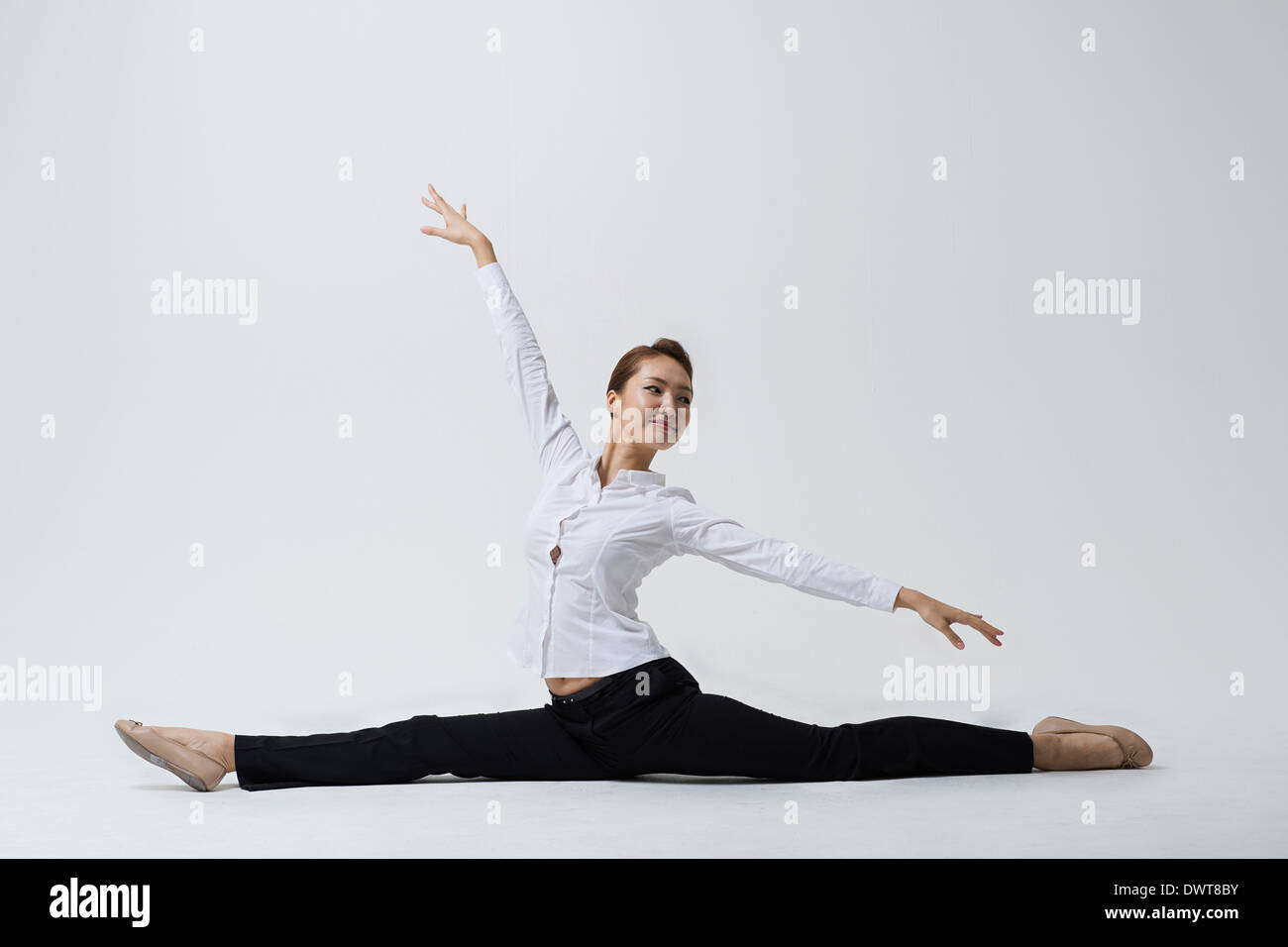 a woman making dance poses Stock Photo - Alamy