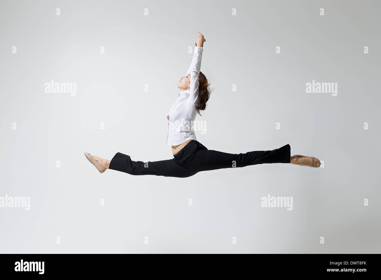 a woman making dance poses Stock Photo - Alamy
