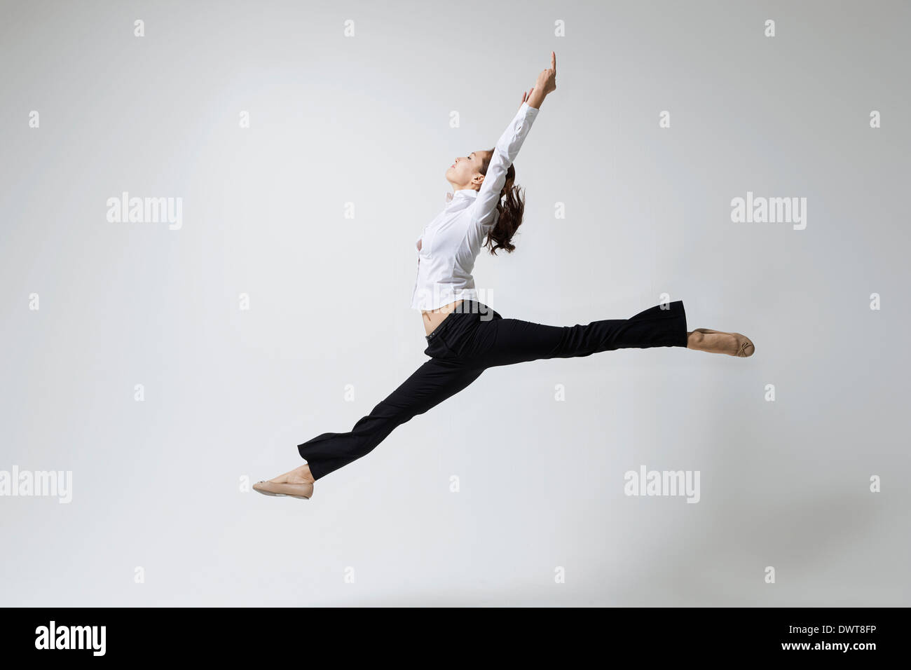 a woman making dance poses Stock Photo - Alamy