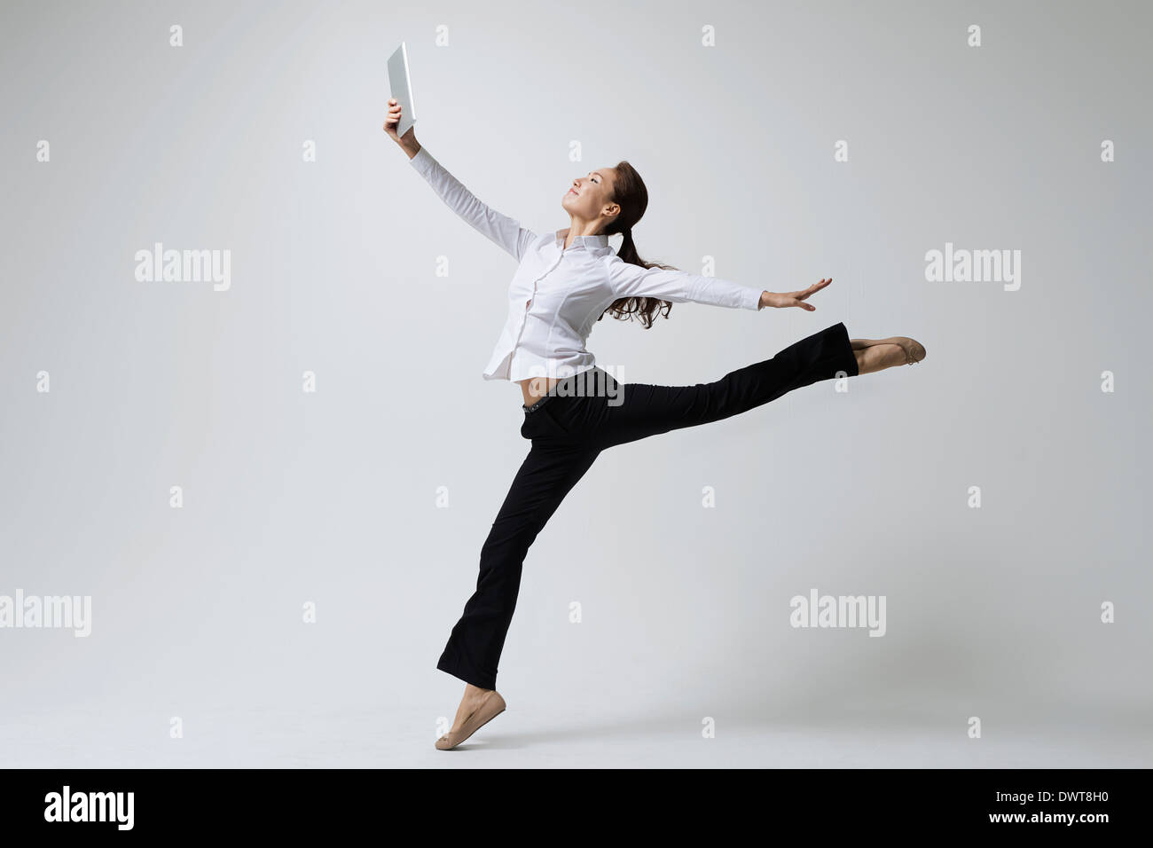 Back view women tablet pc hi-res stock photography and images - Alamy