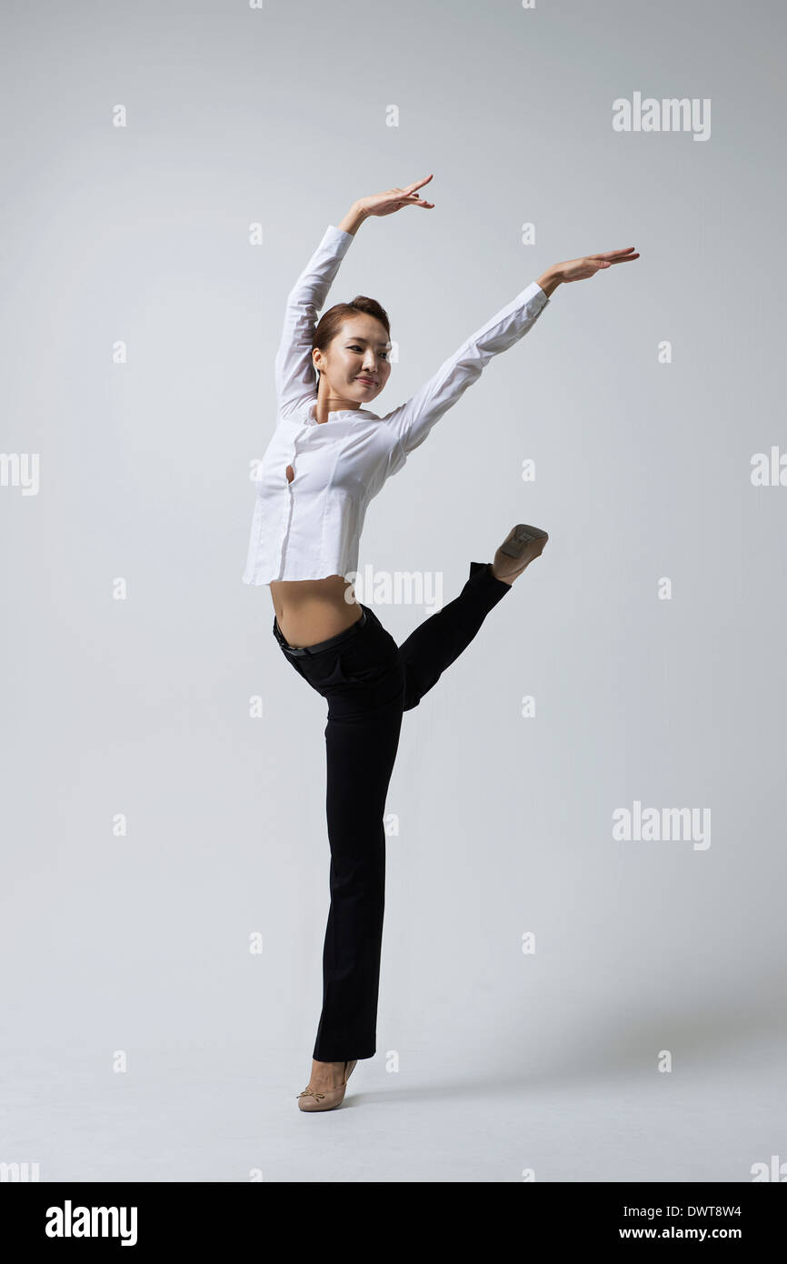 Woman making dance poses hi-res stock photography and images - Alamy