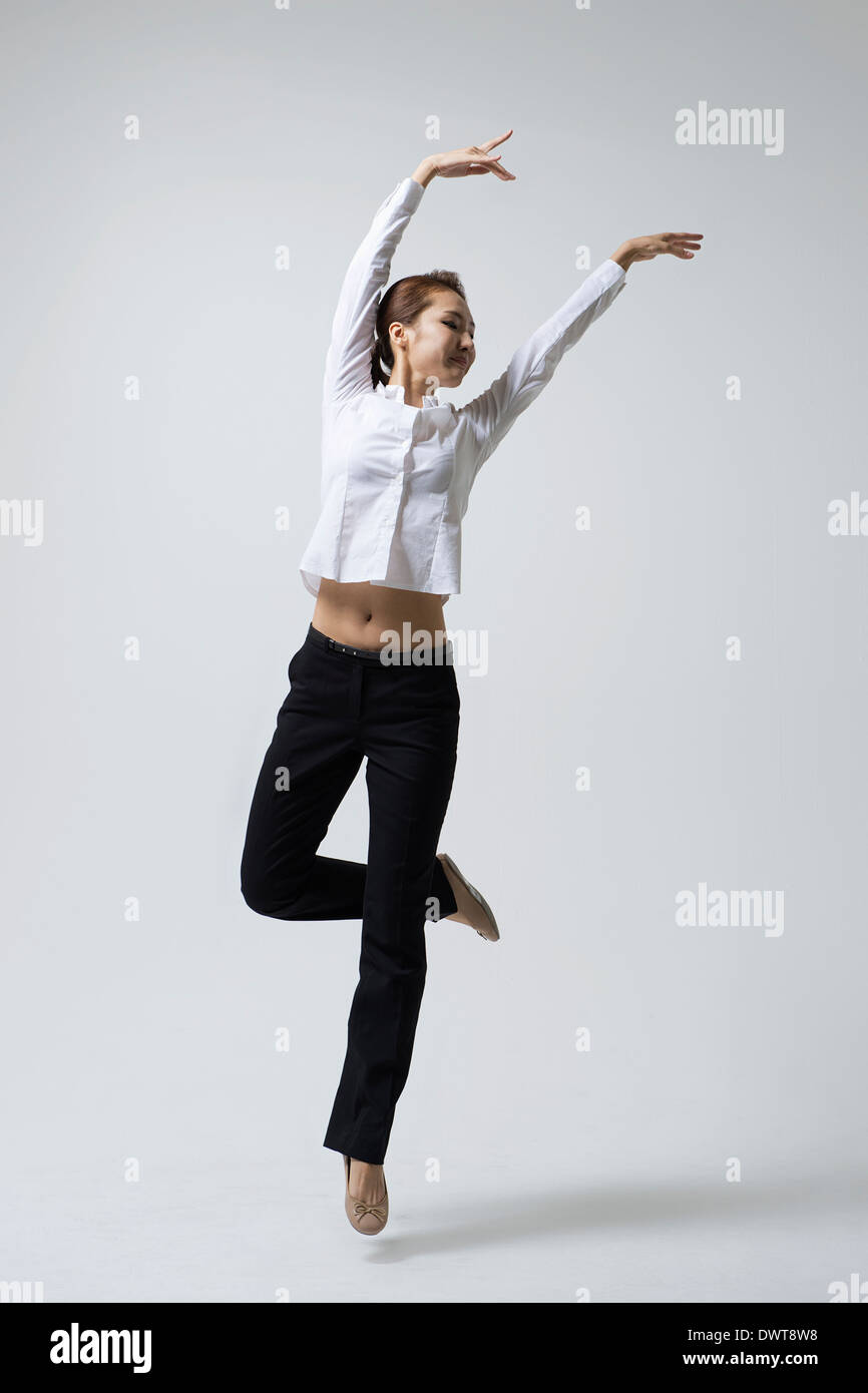 Woman making dance poses hi-res stock photography and images - Alamy