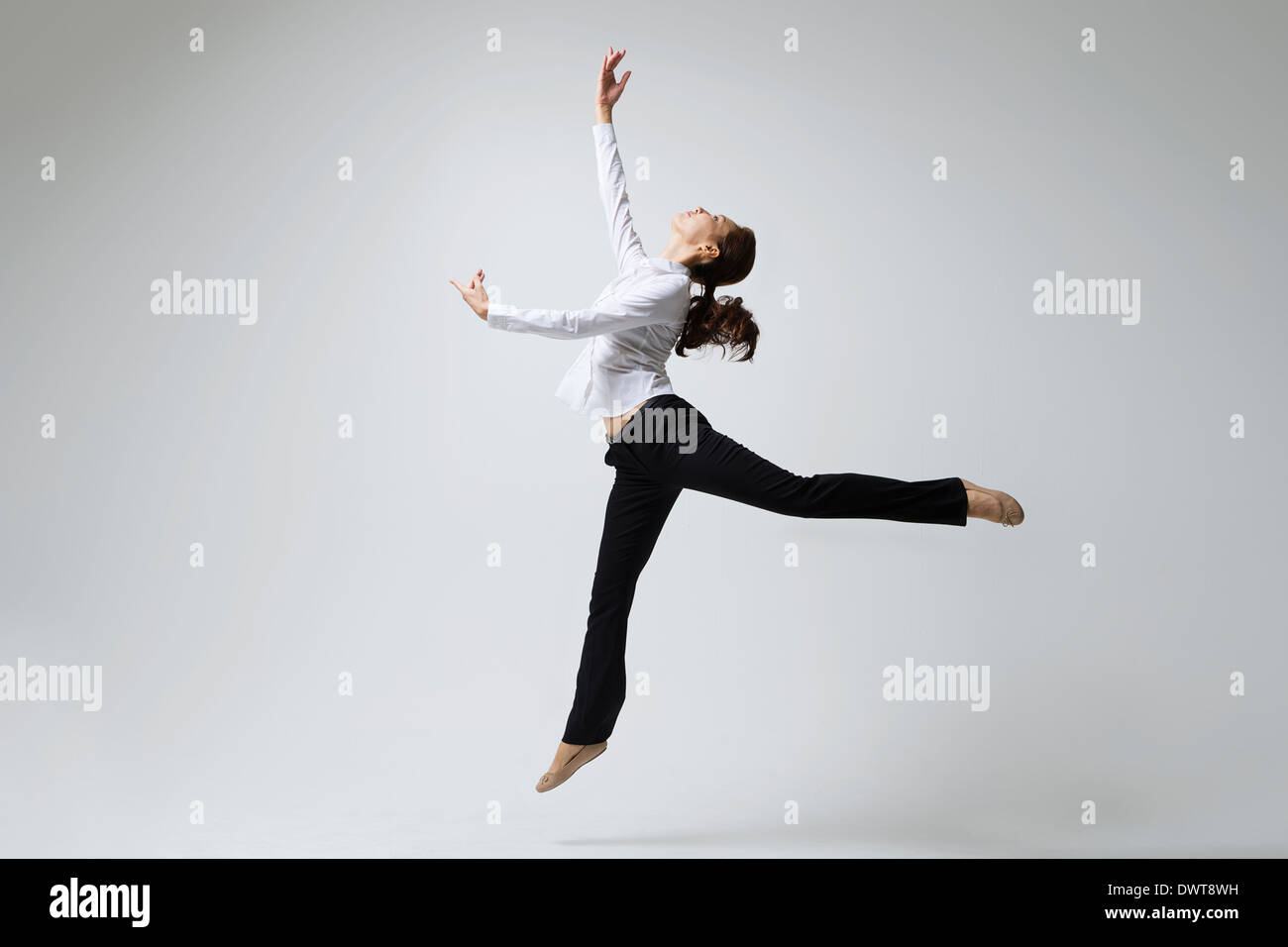 a woman making dance poses Stock Photo - Alamy