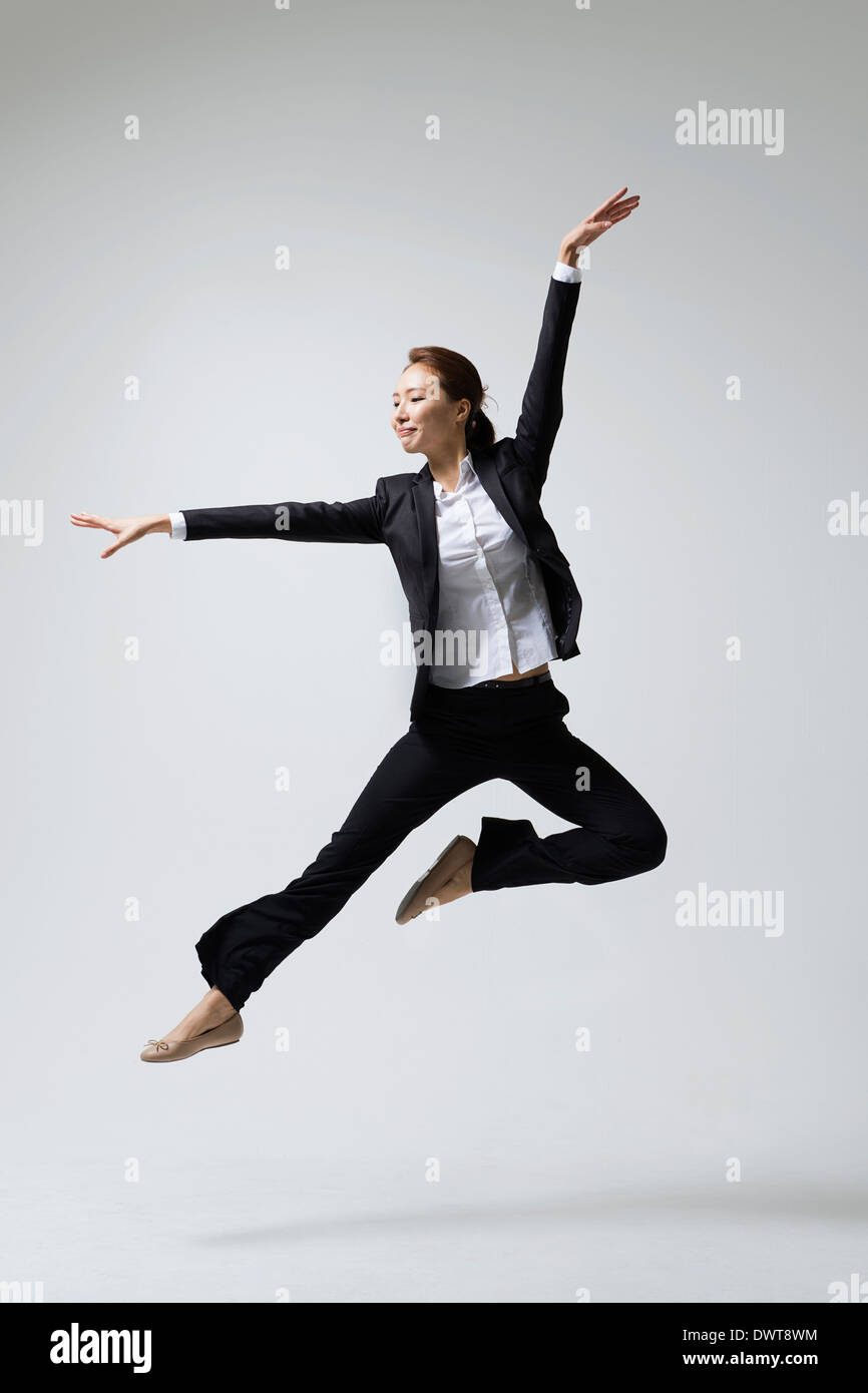 a woman making dance poses Stock Photo - Alamy