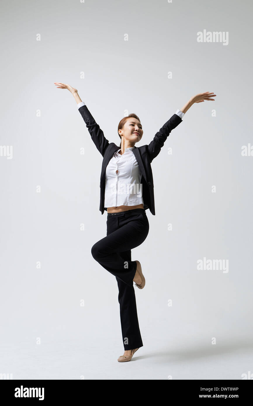 a woman making dance poses Stock Photo - Alamy