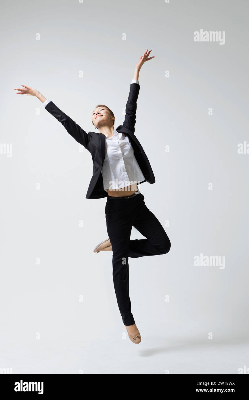 a woman making dance poses Stock Photo - Alamy