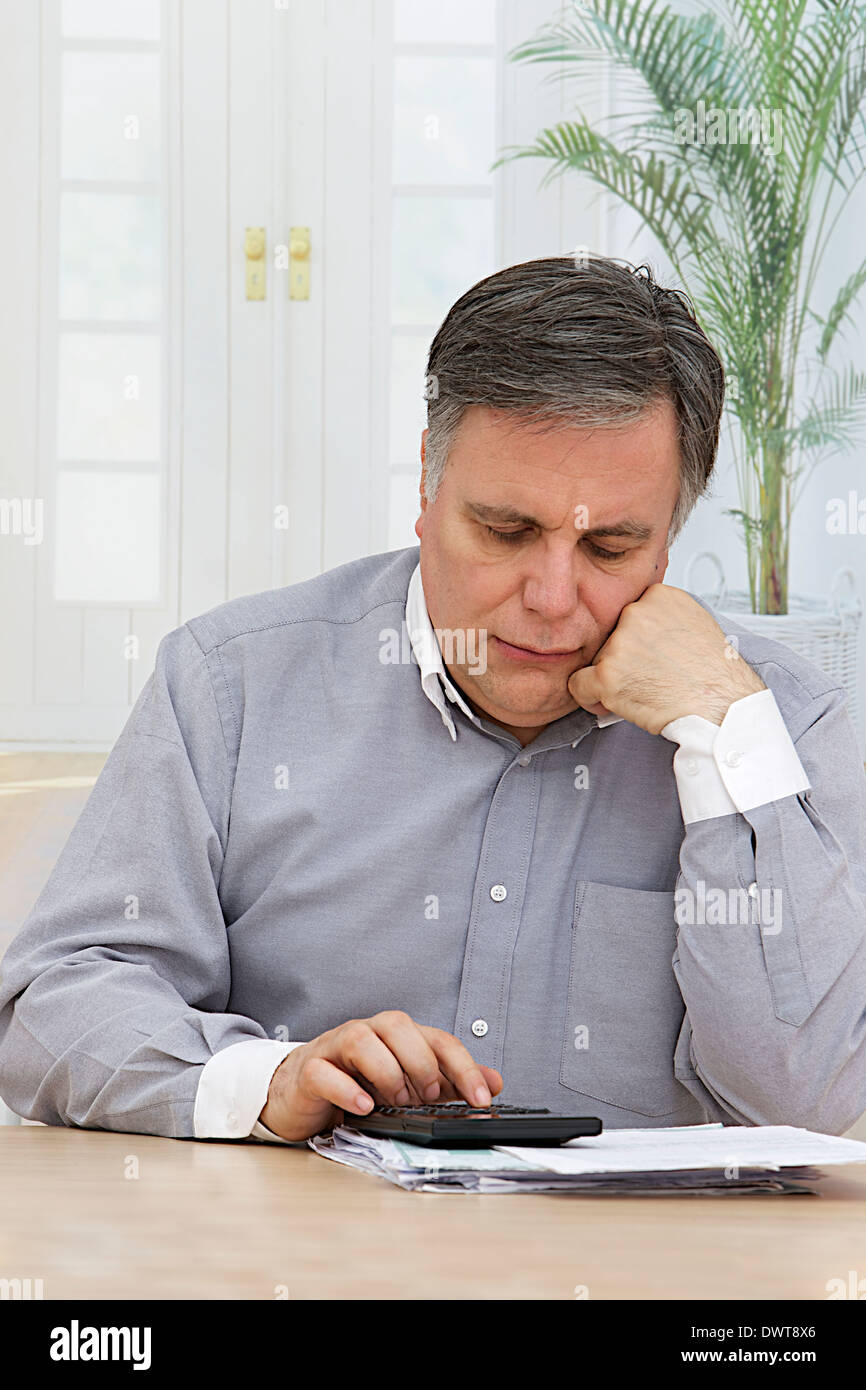 Man doing paperwork Stock Photo - Alamy