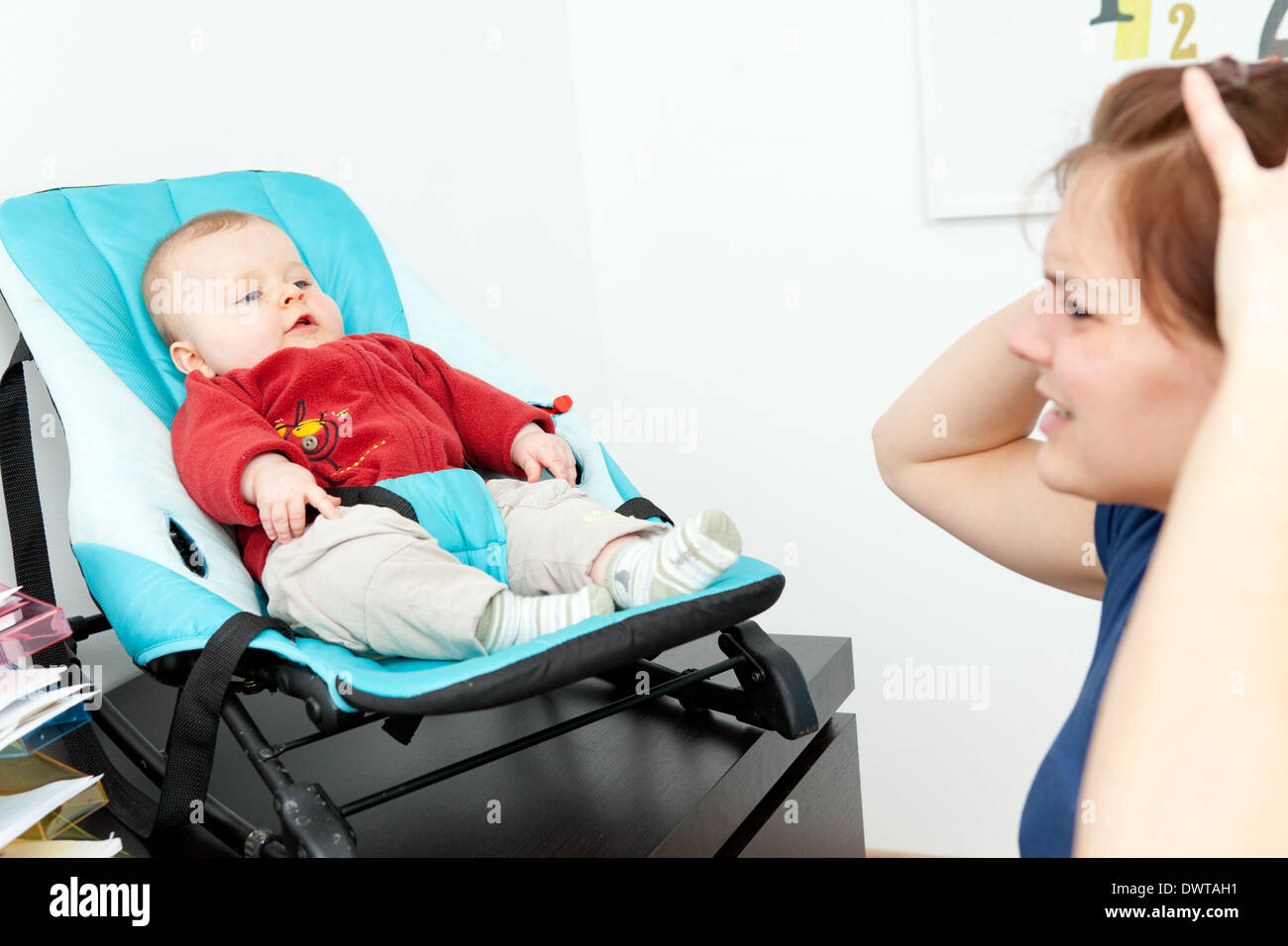 Child care infant Stock Photo - Alamy
