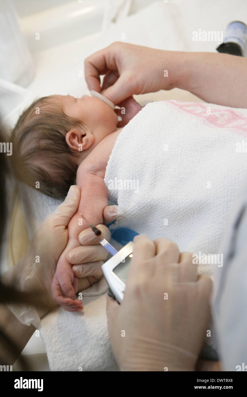 Medical examination newborn baby Stock Photo - Alamy