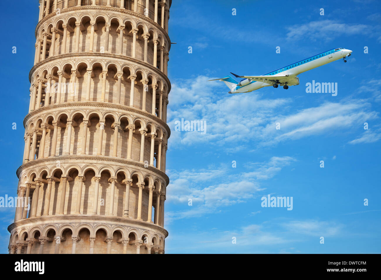 Close shoot of part of the Pisa tower with sky background and airplane ...