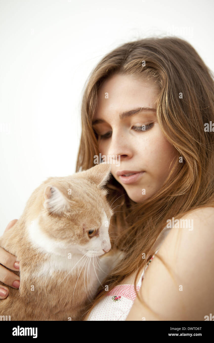 Domestic animal woman Stock Photo - Alamy