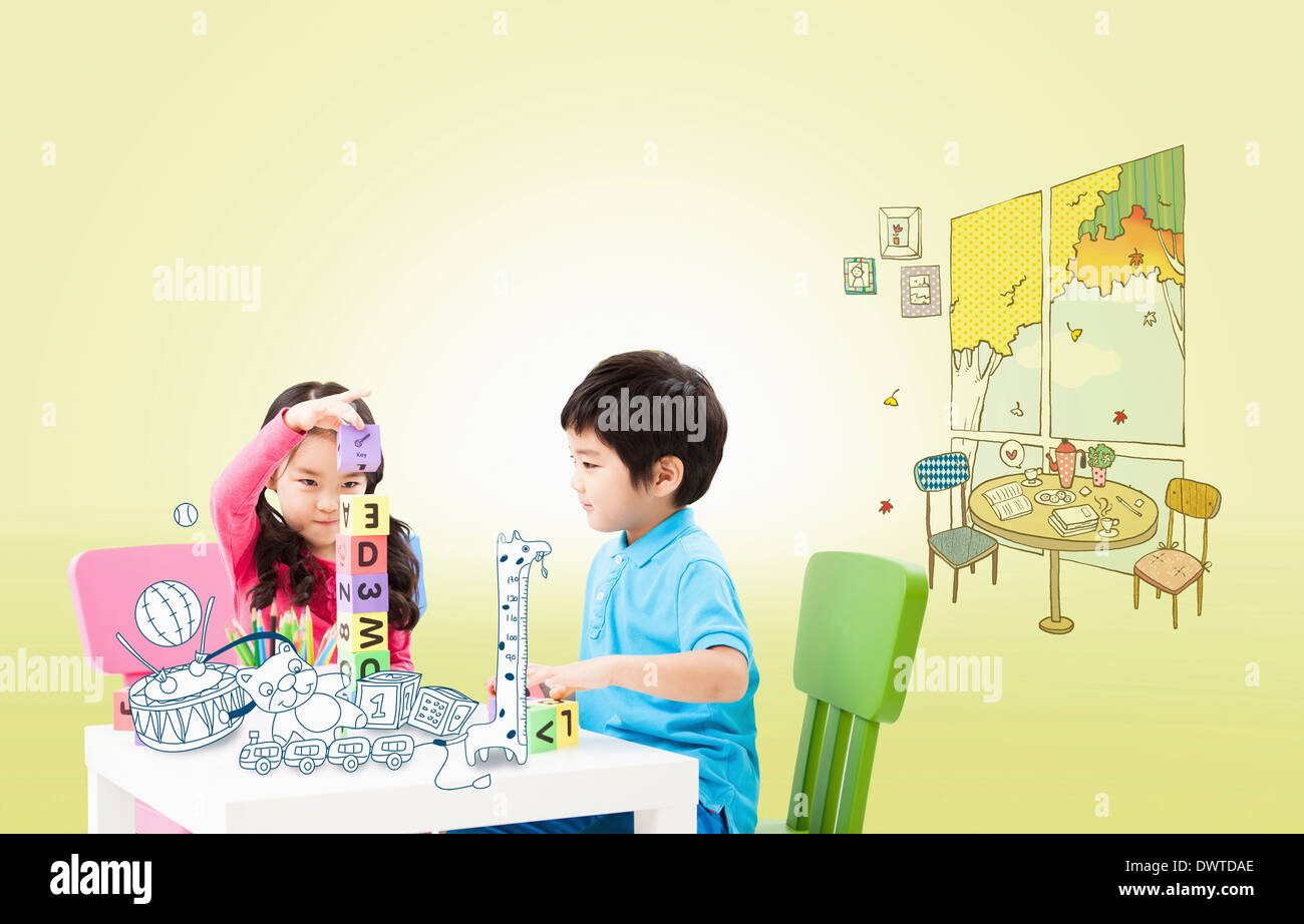 children playing with cubes Stock Photo - Alamy