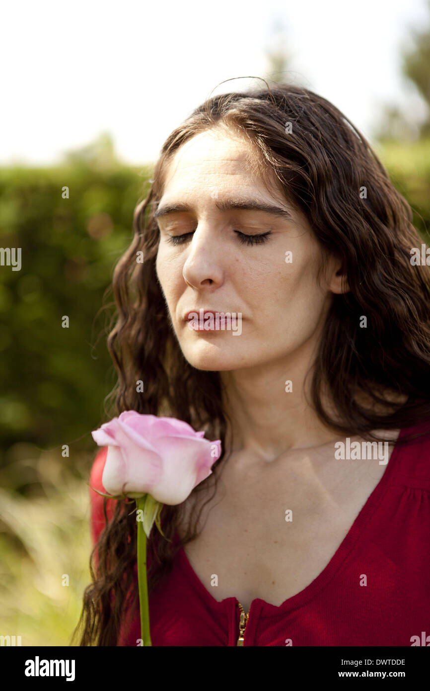 Woman smelling rose sense smell hi-res stock photography and images - Alamy