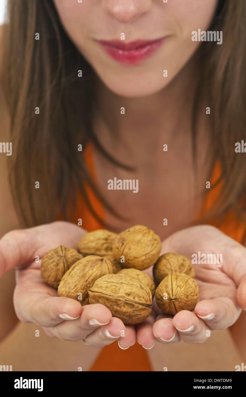 Food english walnut woman Stock Photo - Alamy