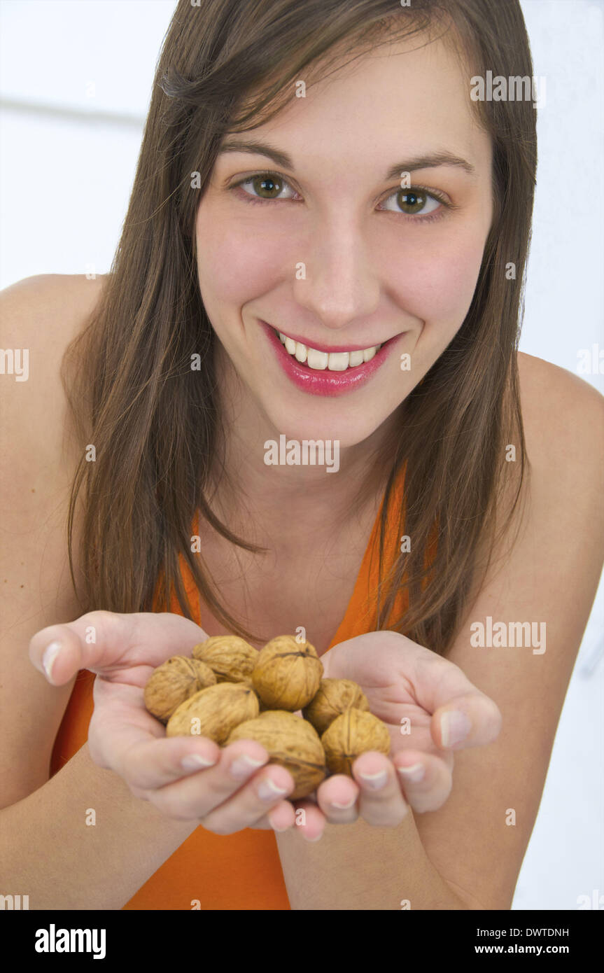 Food english walnut woman Stock Photo - Alamy