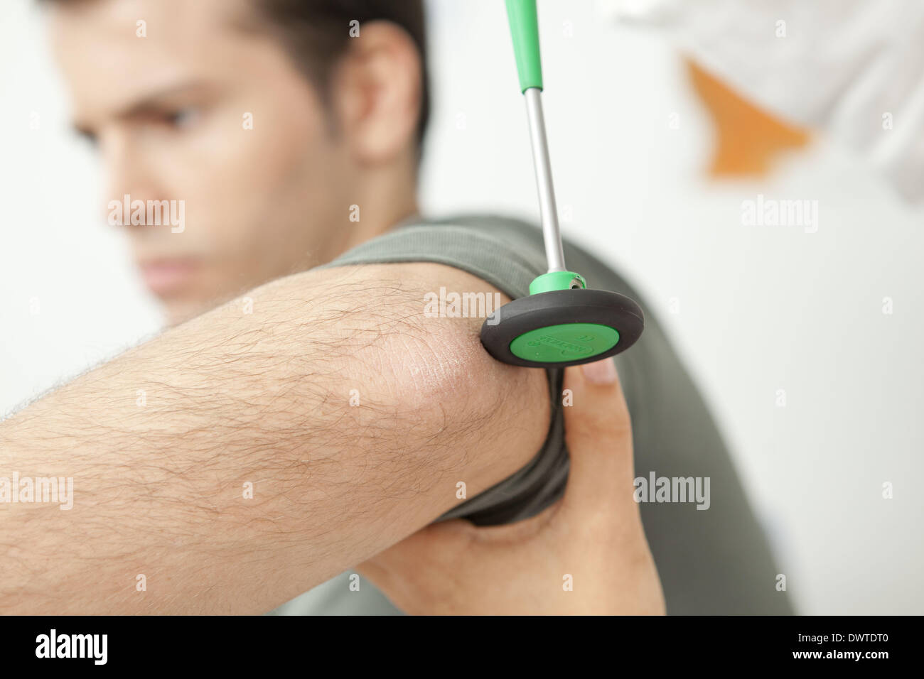 Reflex hammer man Stock Photo - Alamy