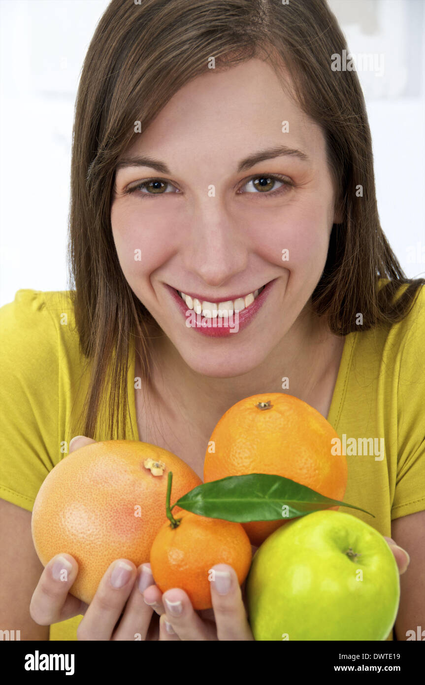 Woman clementine hi-res stock photography and images - Alamy