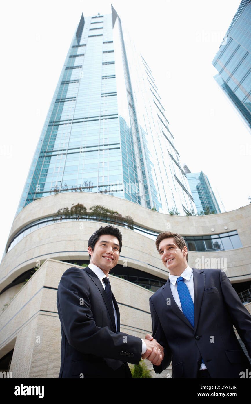 two business men talking outside Stock Photo - Alamy