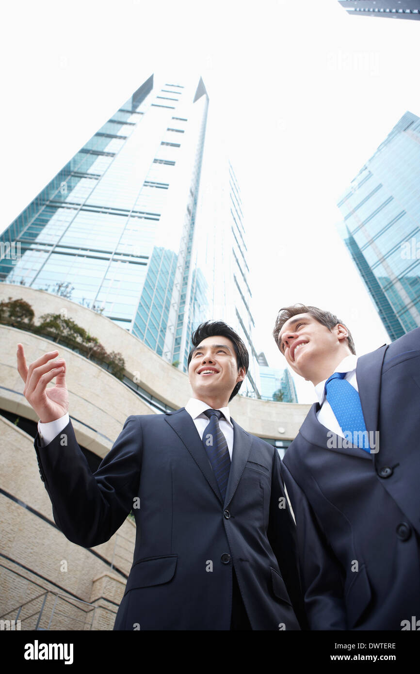 two business men talking outside Stock Photo - Alamy