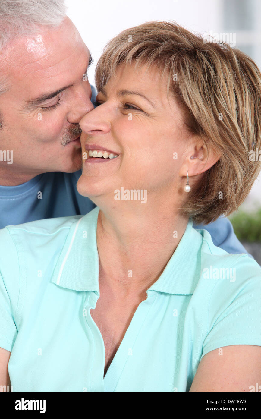 Mature Couple Kissing Tenderly Stock Photo Alamy