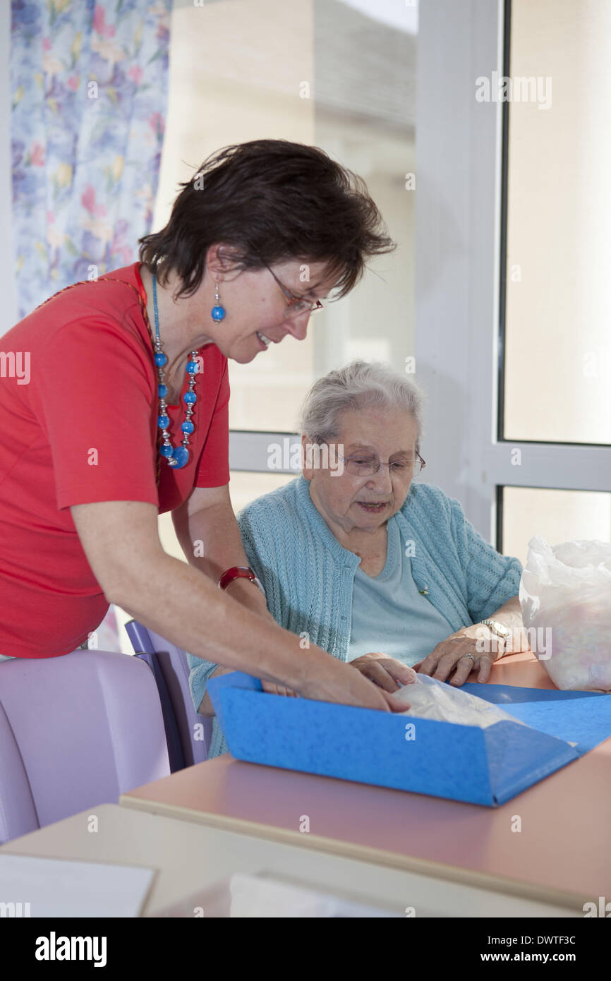 Manual activity senior Stock Photo - Alamy