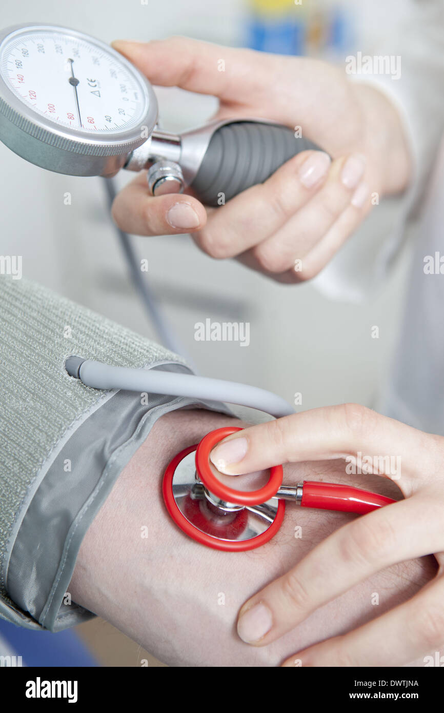 Blood pressure man Stock Photo - Alamy