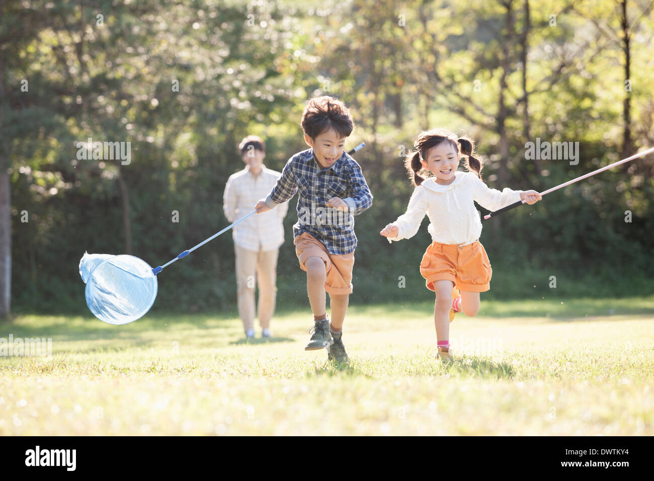 kids catching butterflies Stock Photo, Royalty Free Image: 67540008 - Alamy