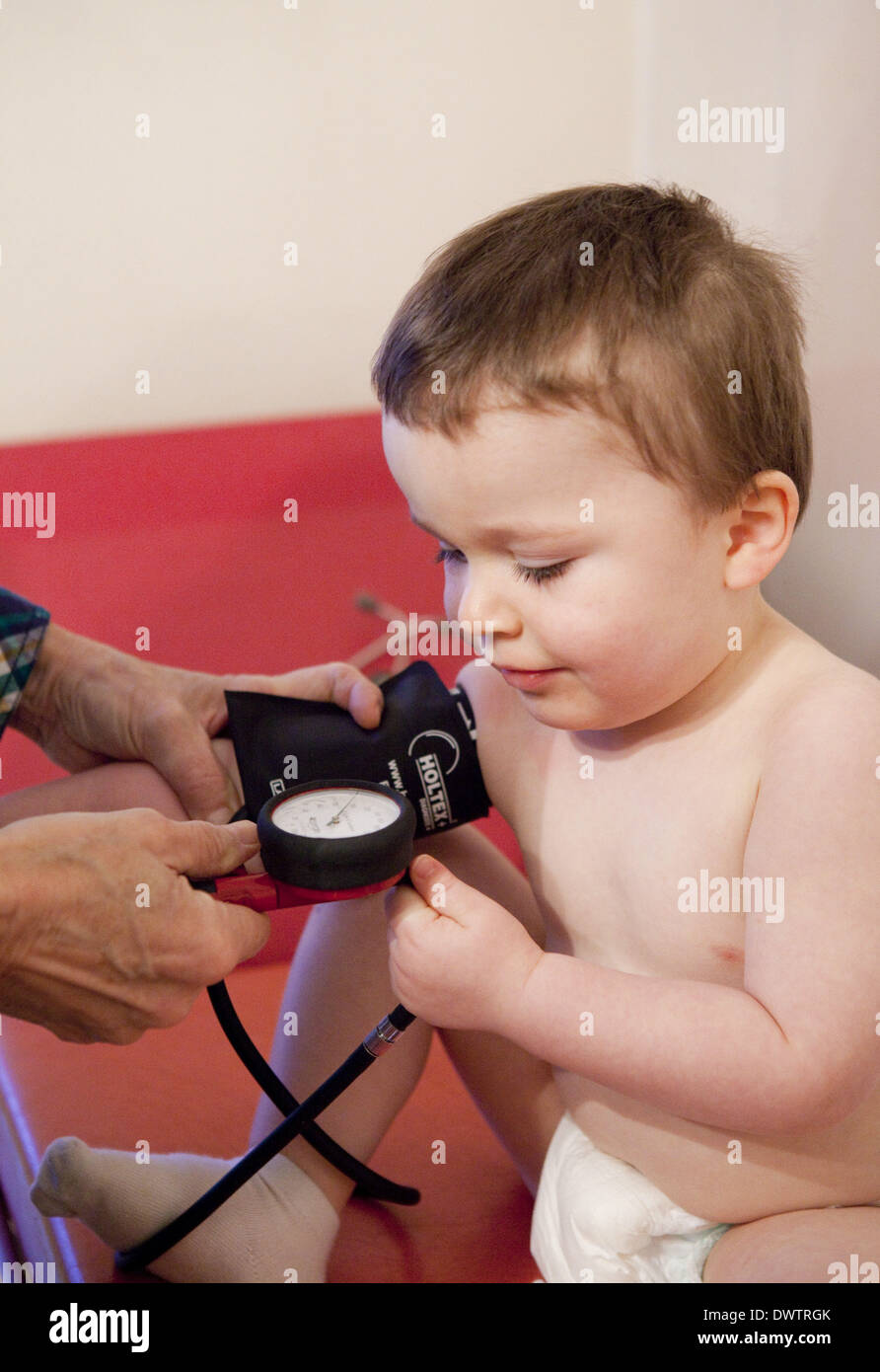 Blood pressure child Stock Photo - Alamy