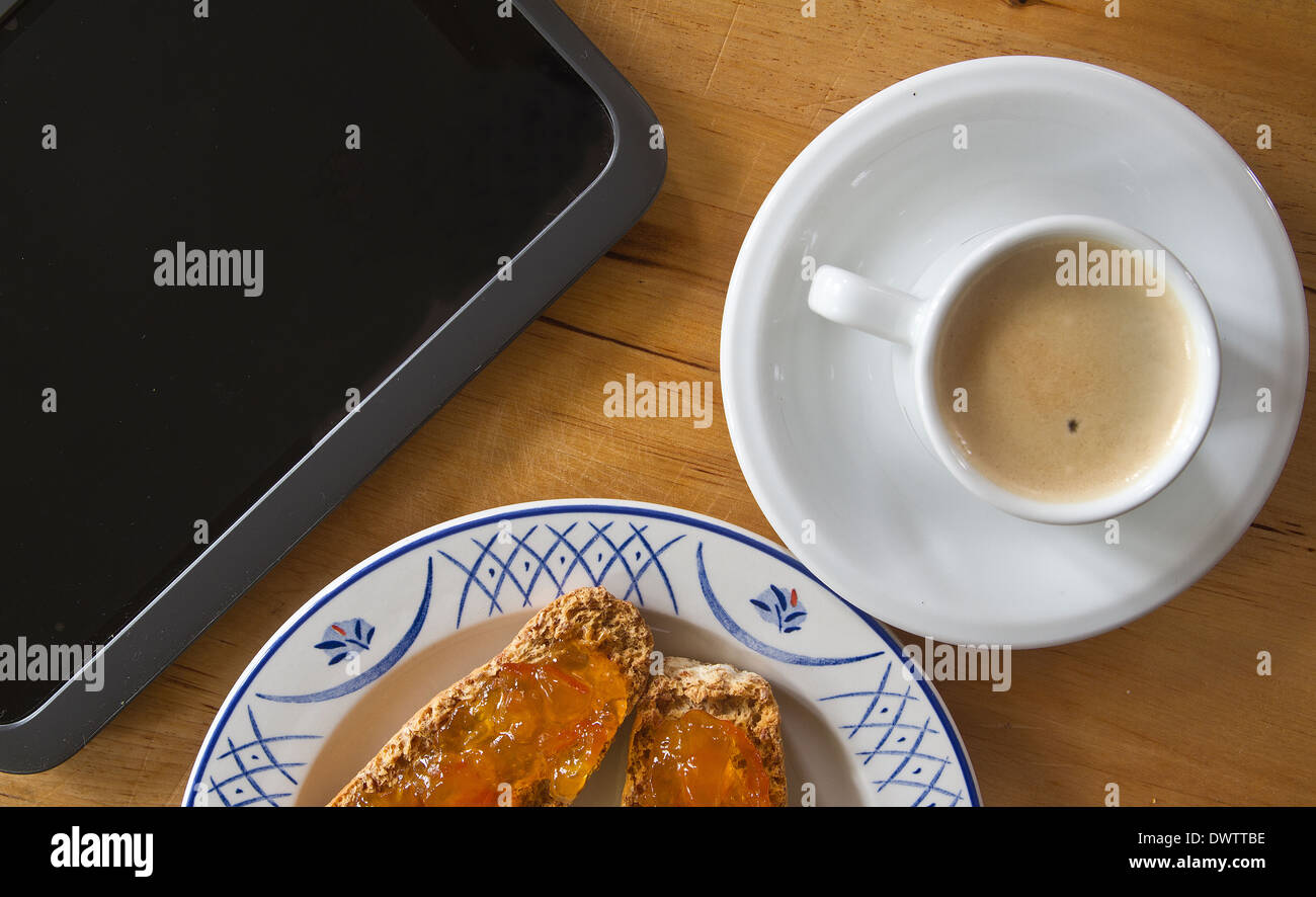 coffee with tablet Stock Photo - Alamy