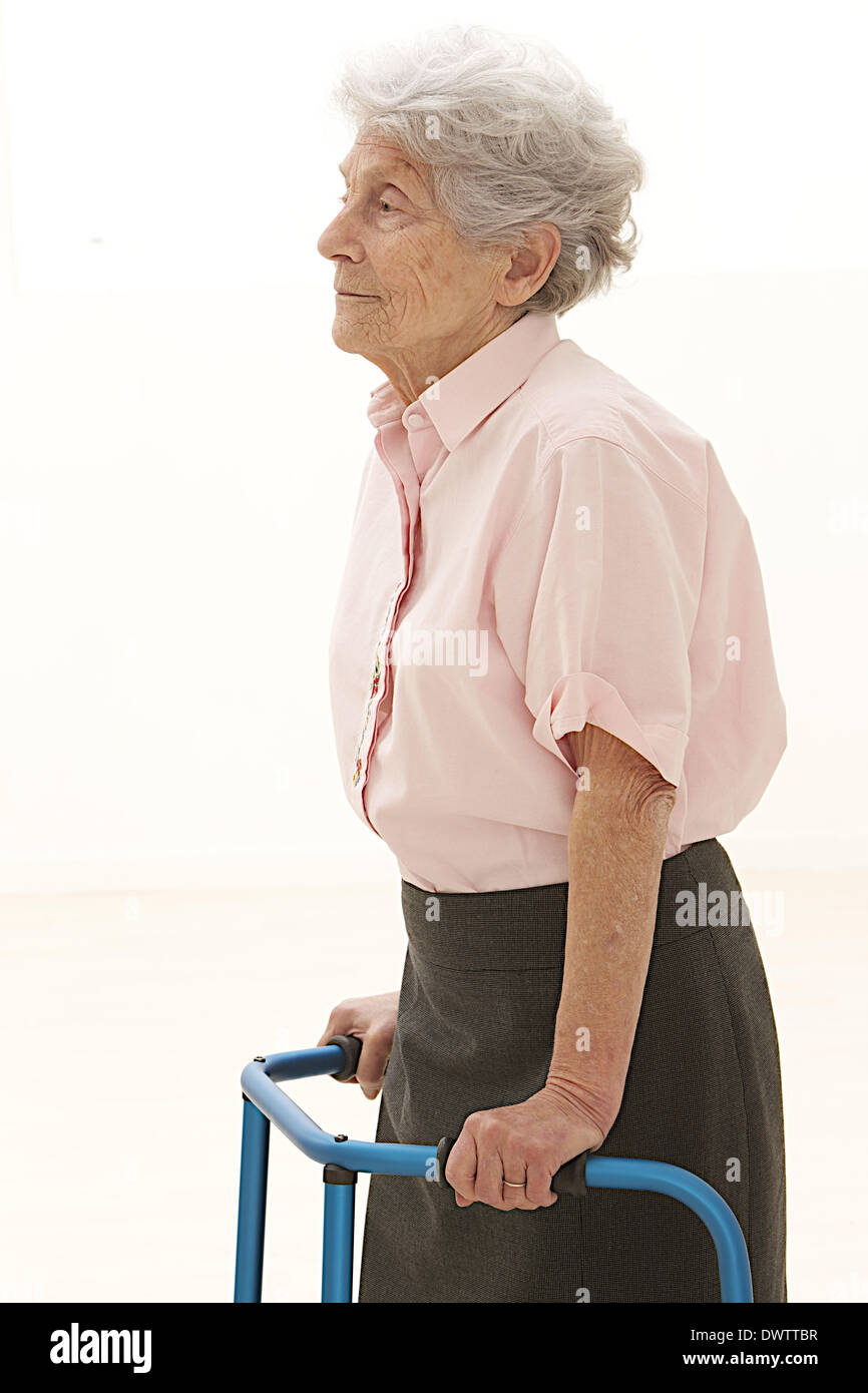 Walking frame senior woman Stock Photo - Alamy