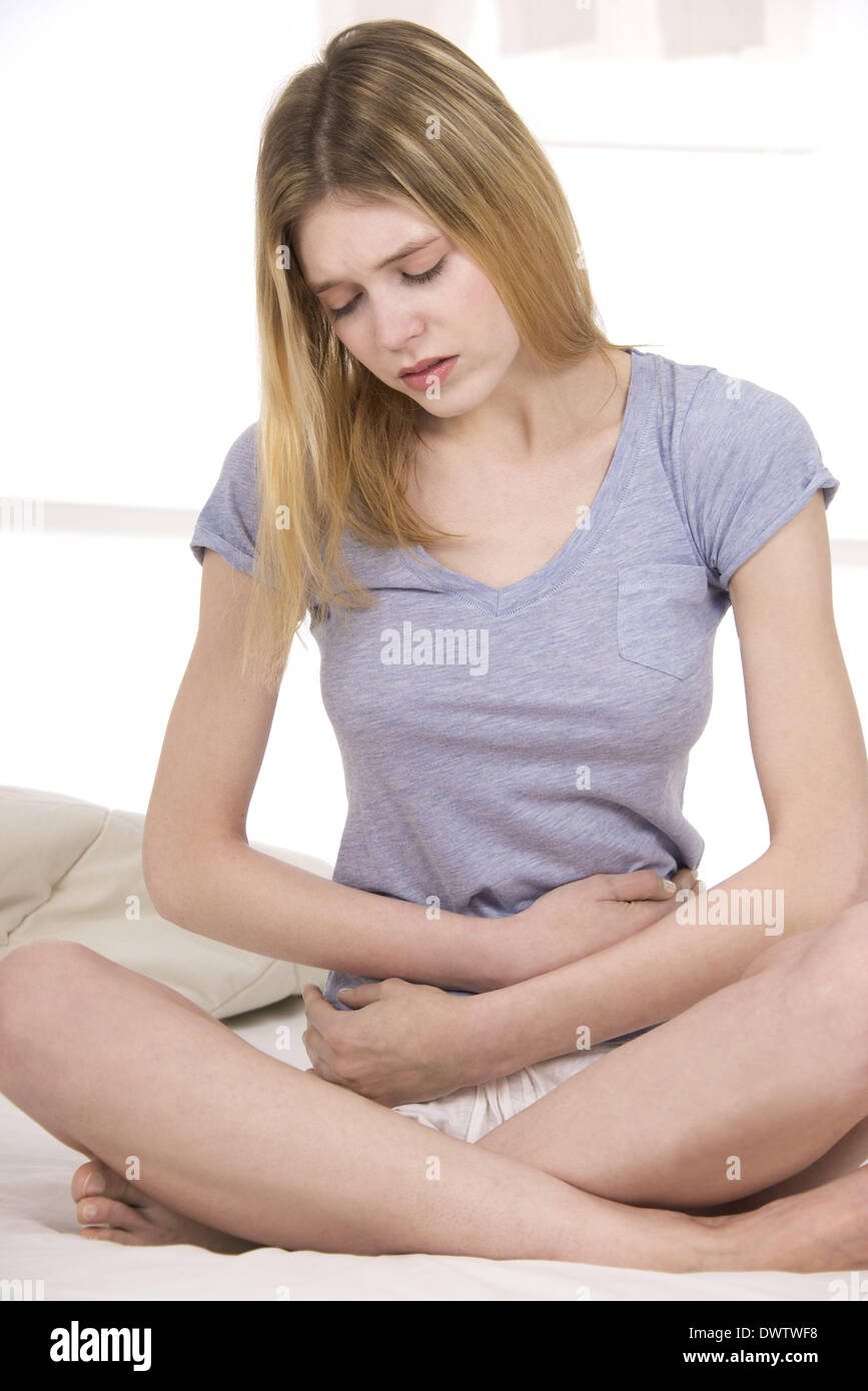 Abdomen pain woman Stock Photo - Alamy