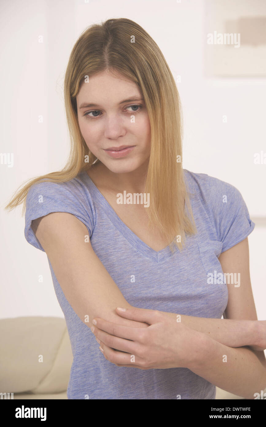 Pain elbow woman Stock Photo - Alamy