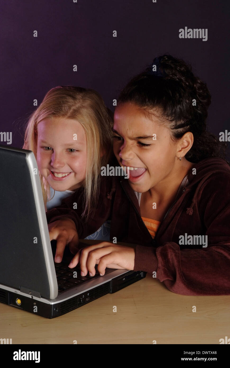 Girls playing computer games. Model released Stock Photo - Alamy