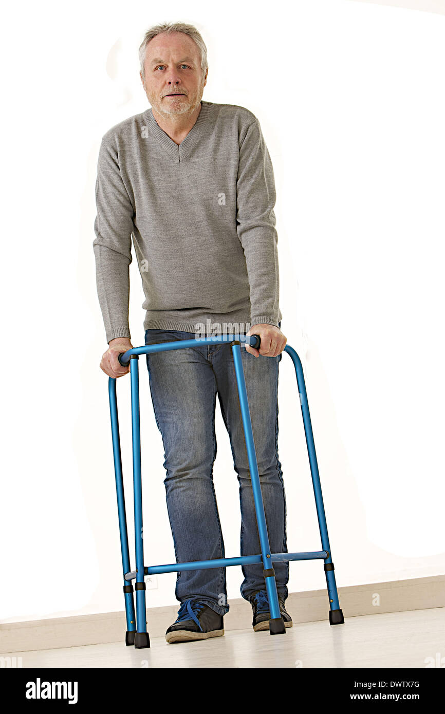 Walking frame senior man Stock Photo - Alamy