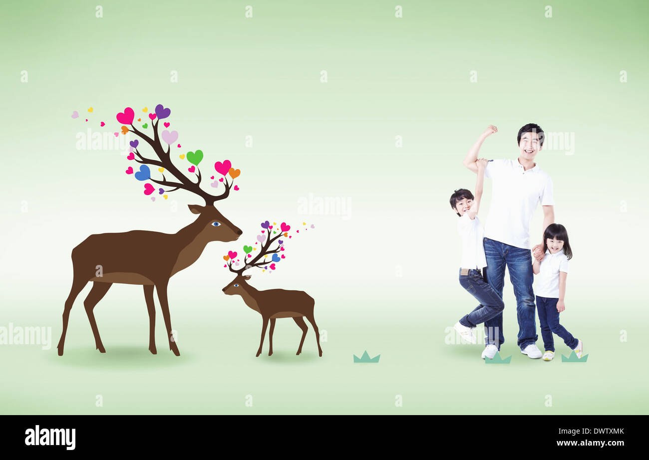 a father and children standing next to deer Stock Photo - Alamy