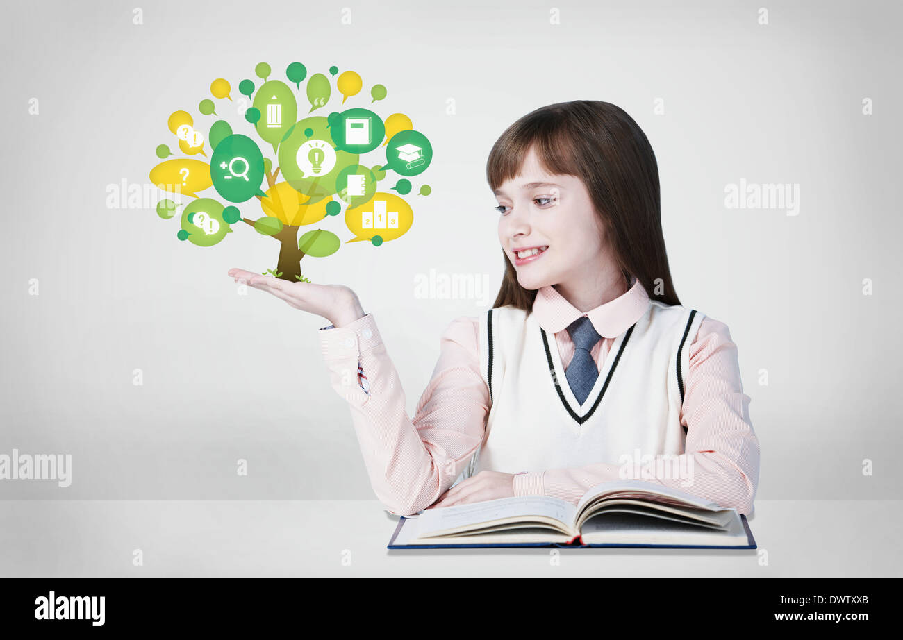 a student with a tree on her hand Stock Photo - Alamy