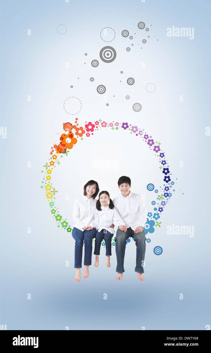 a family sitting on a circle shape Stock Photo - Alamy