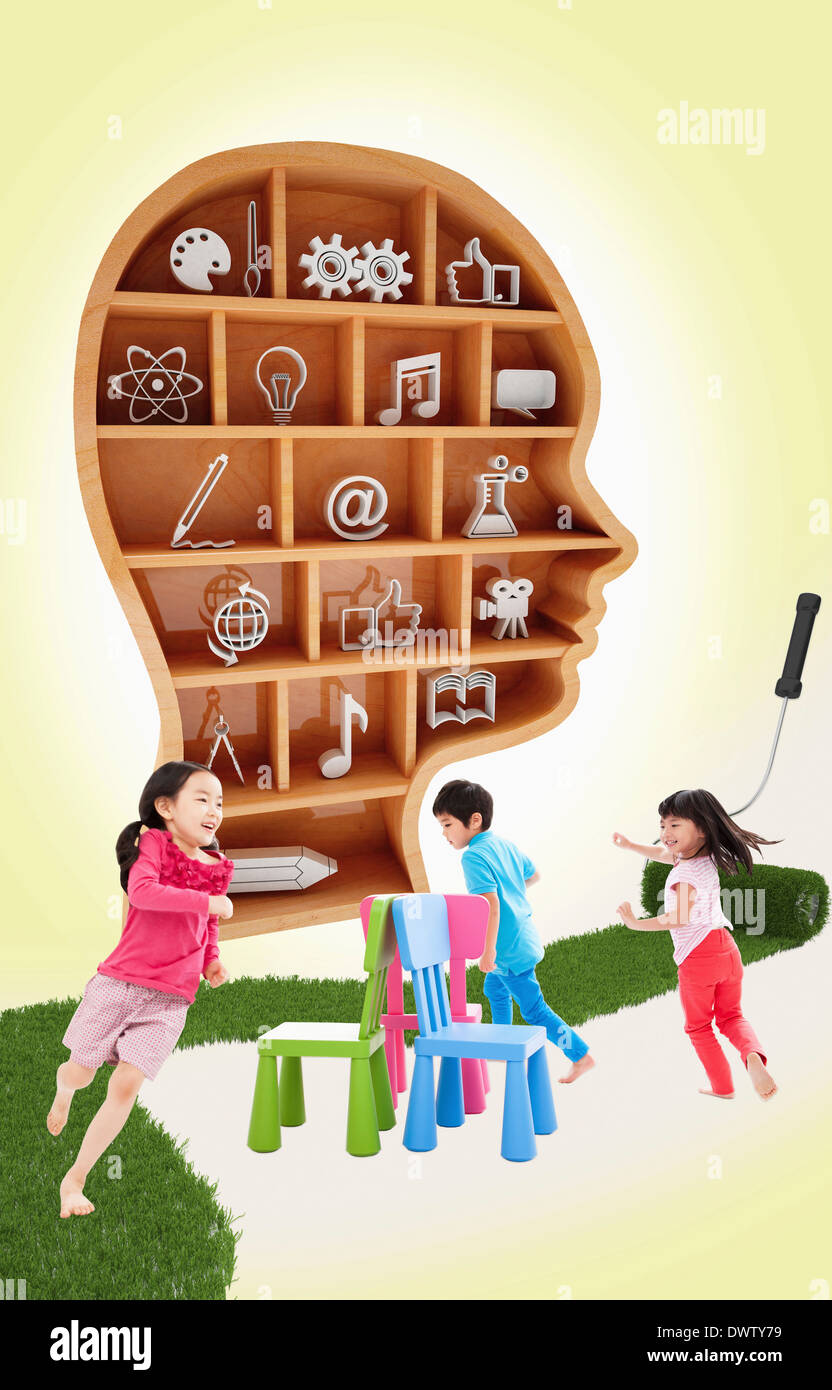 kids running around chairs Stock Photo - Alamy