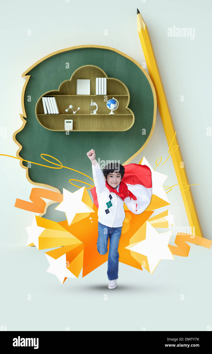 a boy playing superman Stock Photo - Alamy