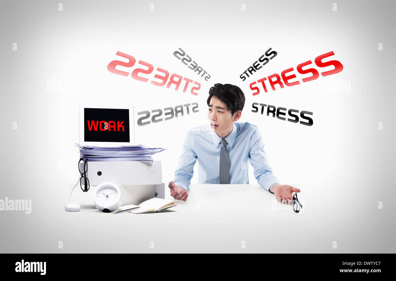 a business man with a lot of stress Stock Photo - Alamy