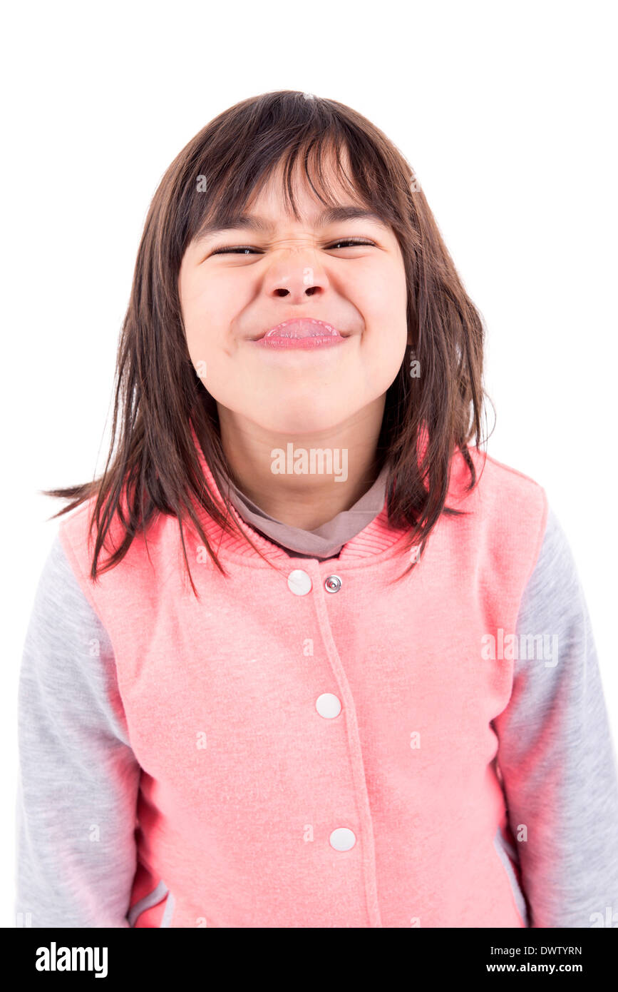 Funny young girl making faces isolated in white Stock Photo - Alamy
