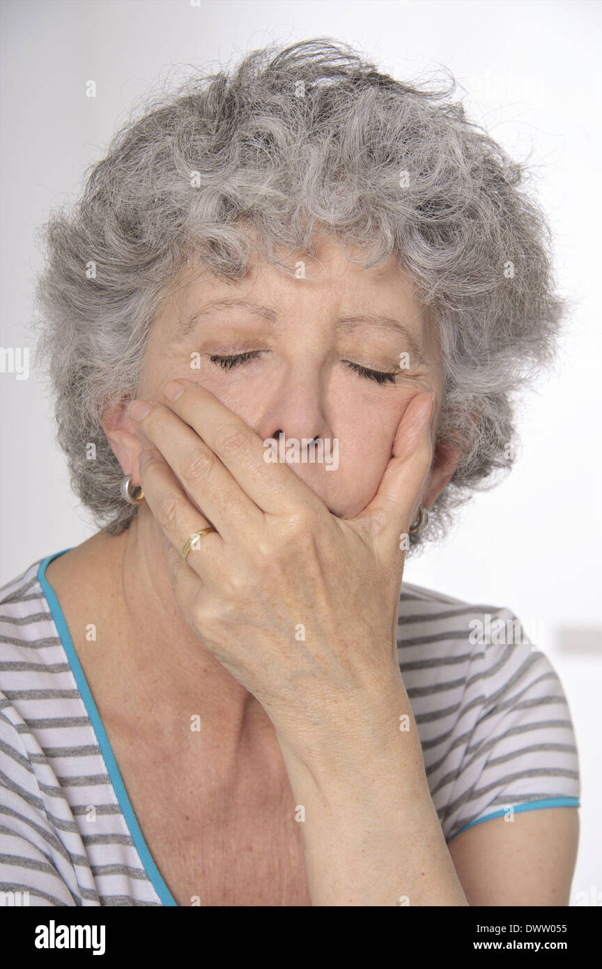 Concern senior woman Stock Photo - Alamy